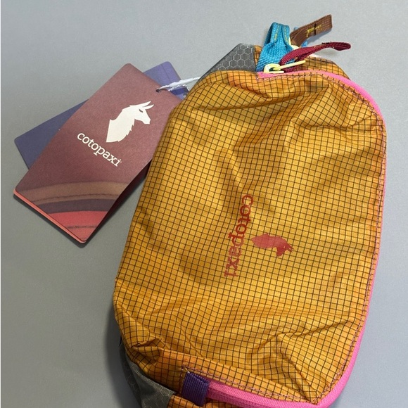 cotopaxi | Bags | Cotopaxi Purple And Yellow Pouch | Poshmark
